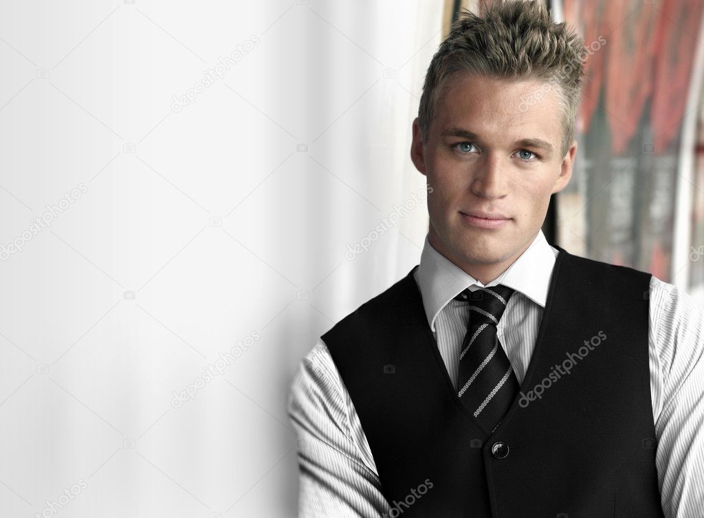 Young good looking businessman with copy space #8512202 - Larastock