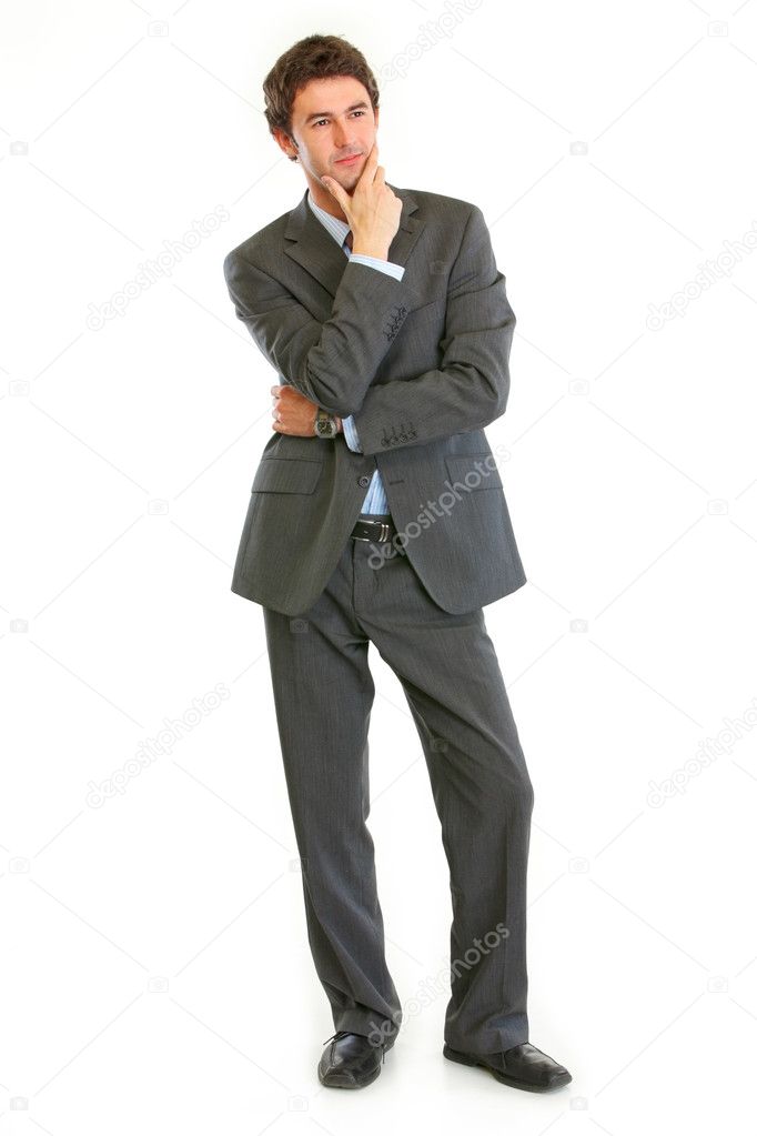 Full length portrait of pensive businessman with hand near face Stock ... Full length portrait of pensive businessman with hand near face Stock ...