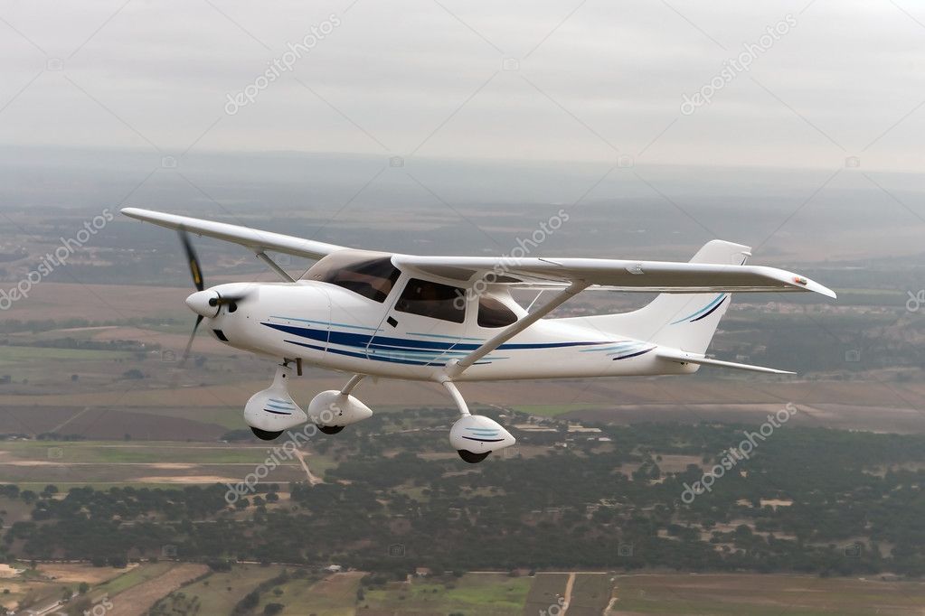 Small airplane flying — Stock Photo © papandreos #9675934