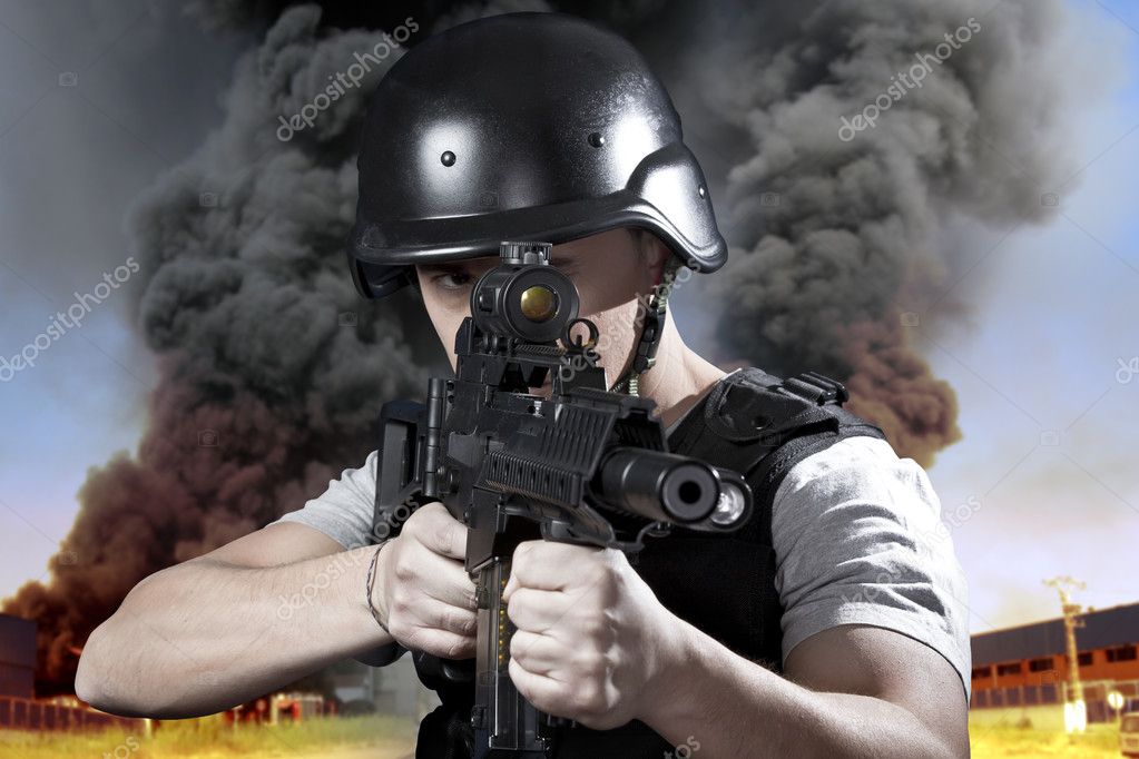 Person, explosion in an industry, armed police wearing bulletpro ...