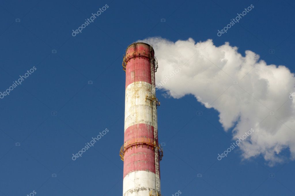 Fuming tube against blue sky — Stock Photo © pilcas #8792971