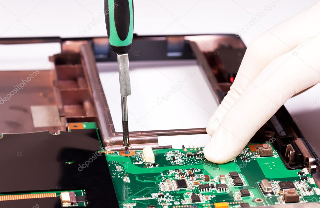 Laptop mother board fixing — Stock Photo © rawgroup #10483747