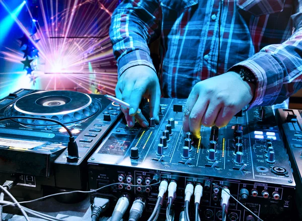 Dj playing the track — Stock Photo © maxoidos #26300875