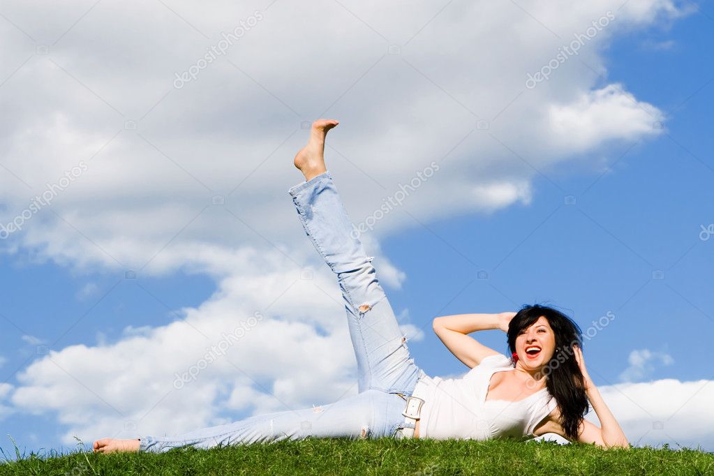 Pretty woman rest on the green grass — Stock Photo © suravid #9251152