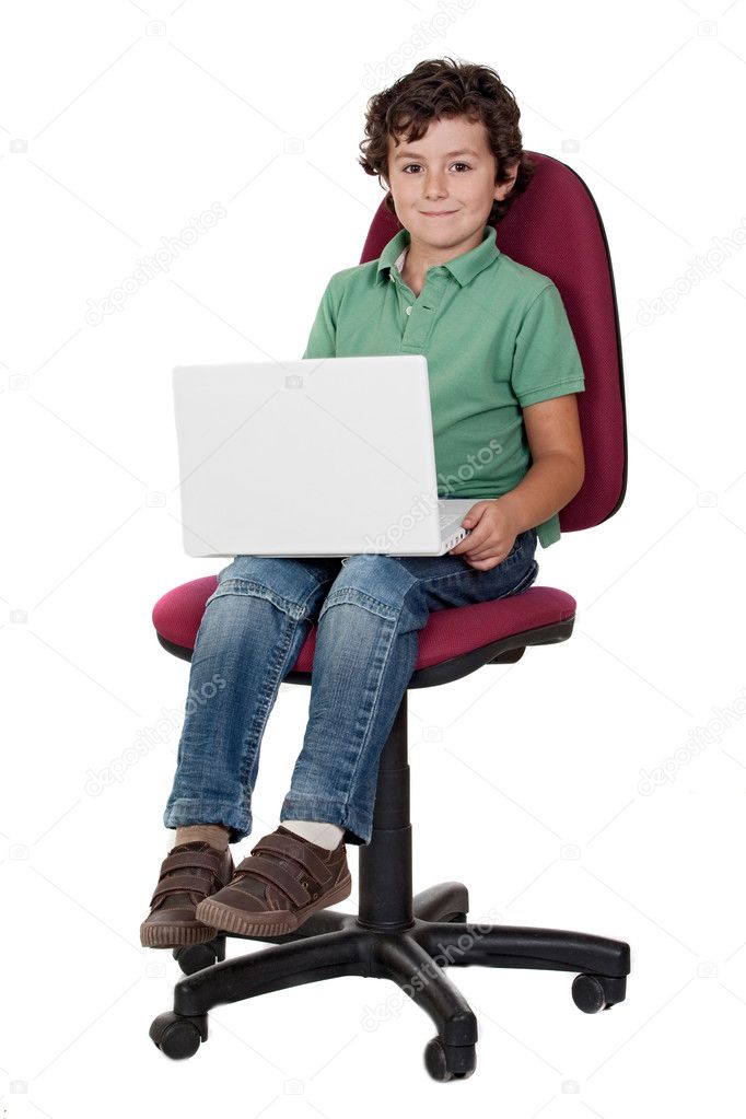 Adorable little boy sitting on big chair with laptop Stock Photo by ...