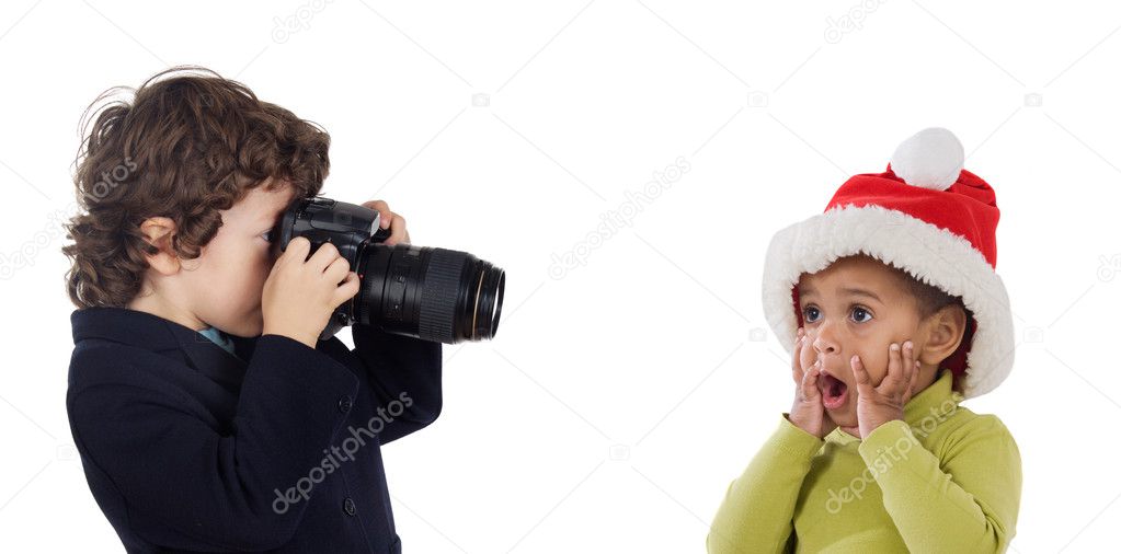 Little photographer making a picture of a baby with Santa Claus — Stock ...