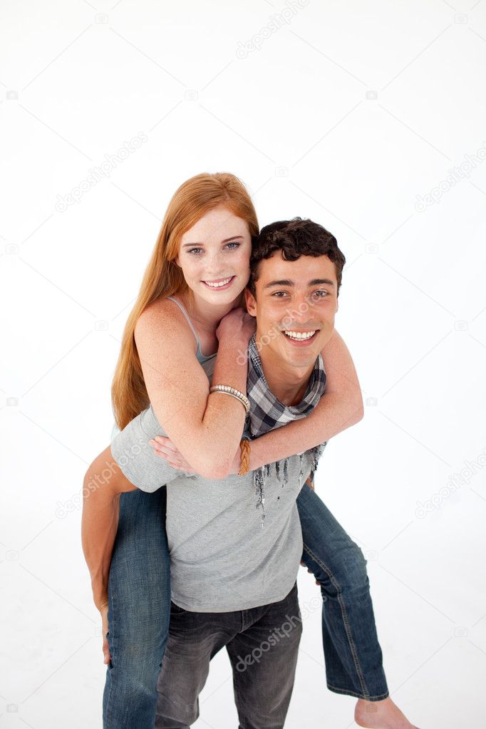 Young boy giving his friend piggyback ride Stock Photo by ...
