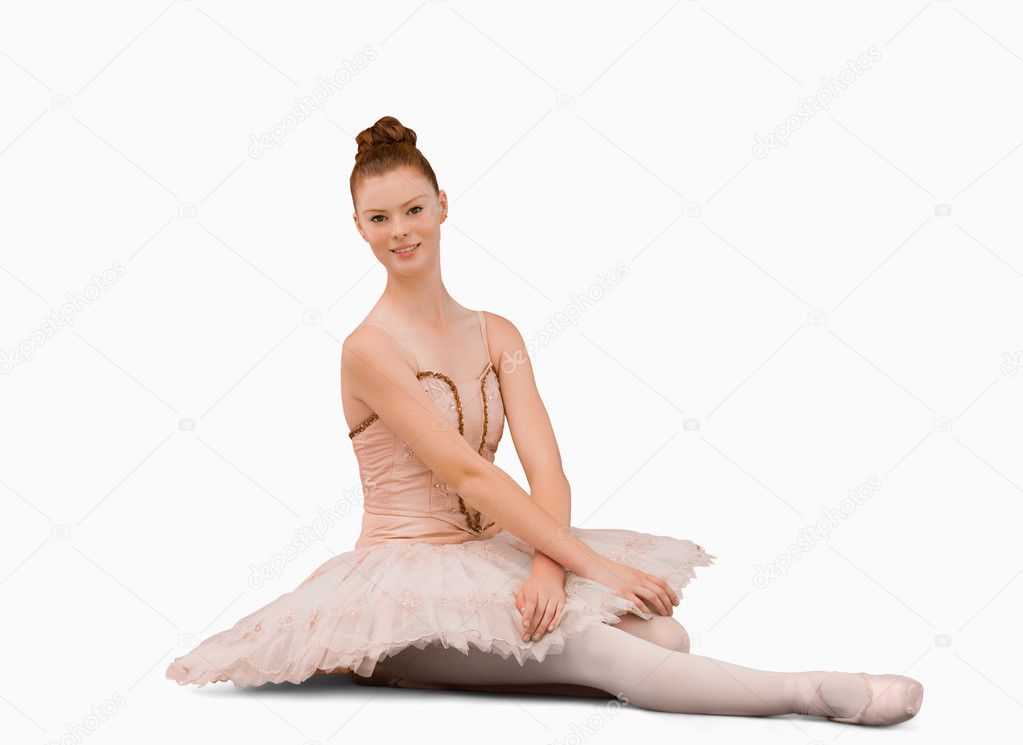 Ballerina sitting Stock Photo by ©Wavebreakmedia 10337311