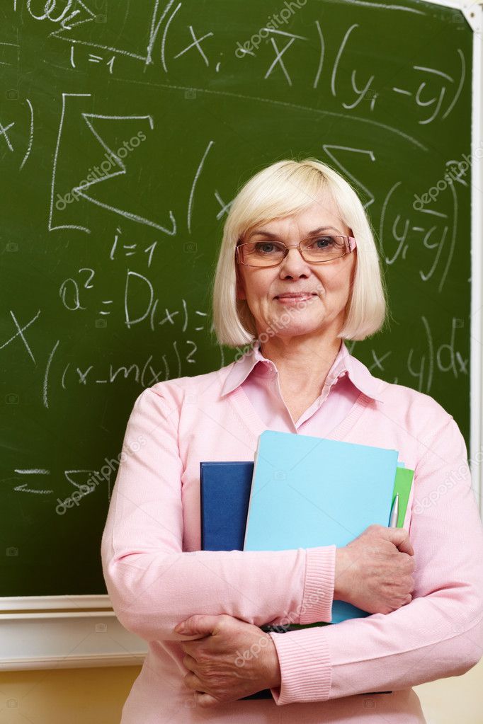 Confident teacher — Stock Photo © pressmaster #10733001 Confident teacher — Stock Photo © pressmaster #10733001
